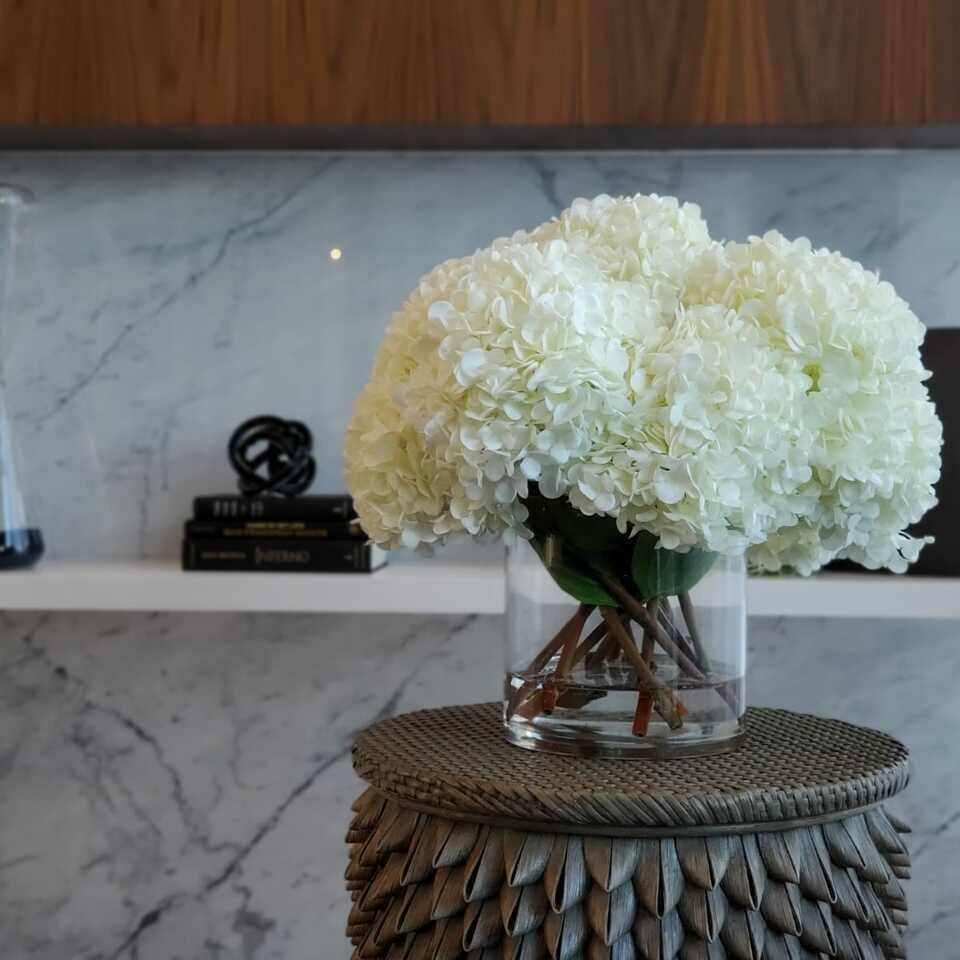 White Hydrangea Bouquet in clear glass cylinder vase - CFA Design Group